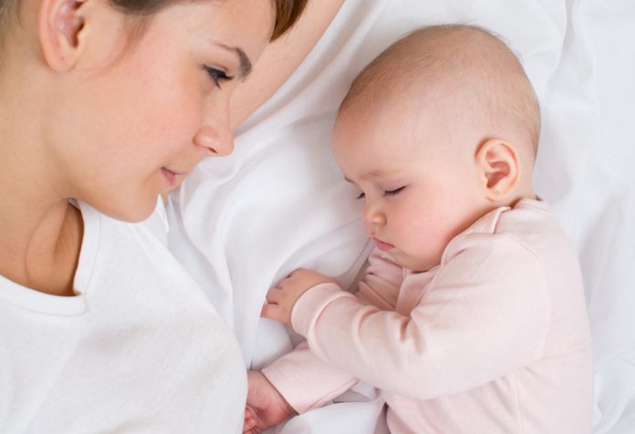 2 Month Old Baby: Growth, Milestones, & Activities